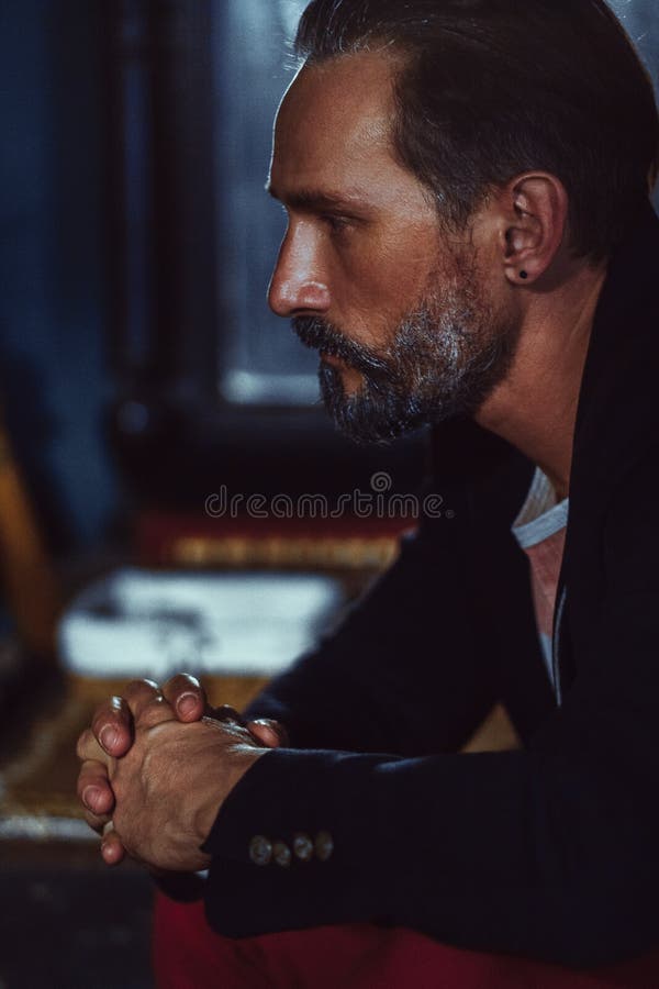 A Bearded Man Freelancer in a Black Jacket with a Beautiful Appearance ...