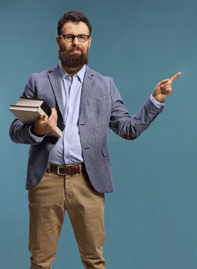 Bearded Man Holding Books and Pointing Stock Image - Image of cheerful ...