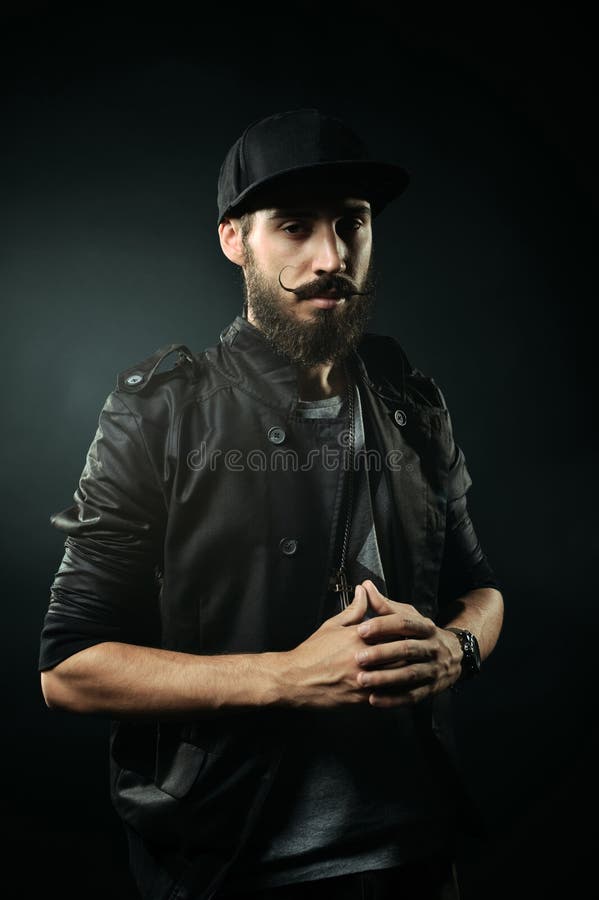 The Bearded Man in a Jacket Folded His Arms in a Lock Stock Photo ...