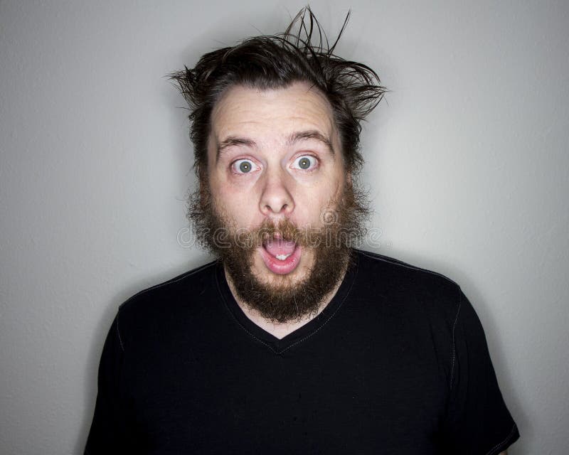 Bearded Man Looking at the Camera Shocked Stock Image - Image of casual ...