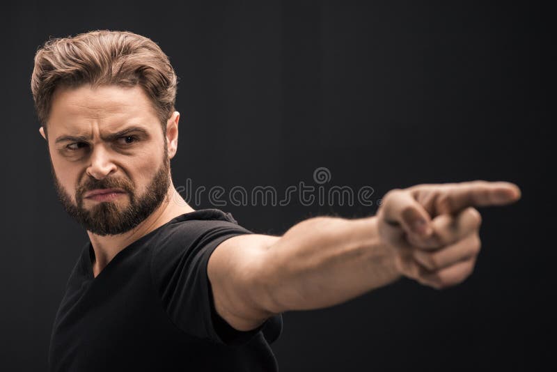Bearded Man Pointing on Black with Copy Space Stock Photo - Image of ...