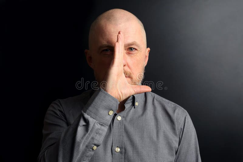 Bearded Man Shielded Half of His Face from the Light with His Palm ...