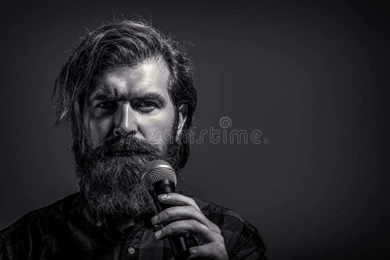 Bearded Man Singing with Microphone. Male Singing with a Microphones ...