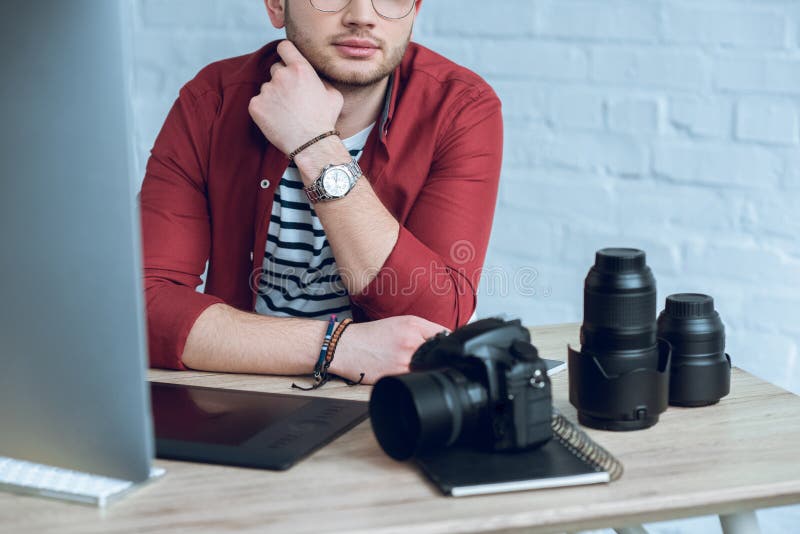 Bearded Man Sitting by Table with Camera Stock Image - Image of ...
