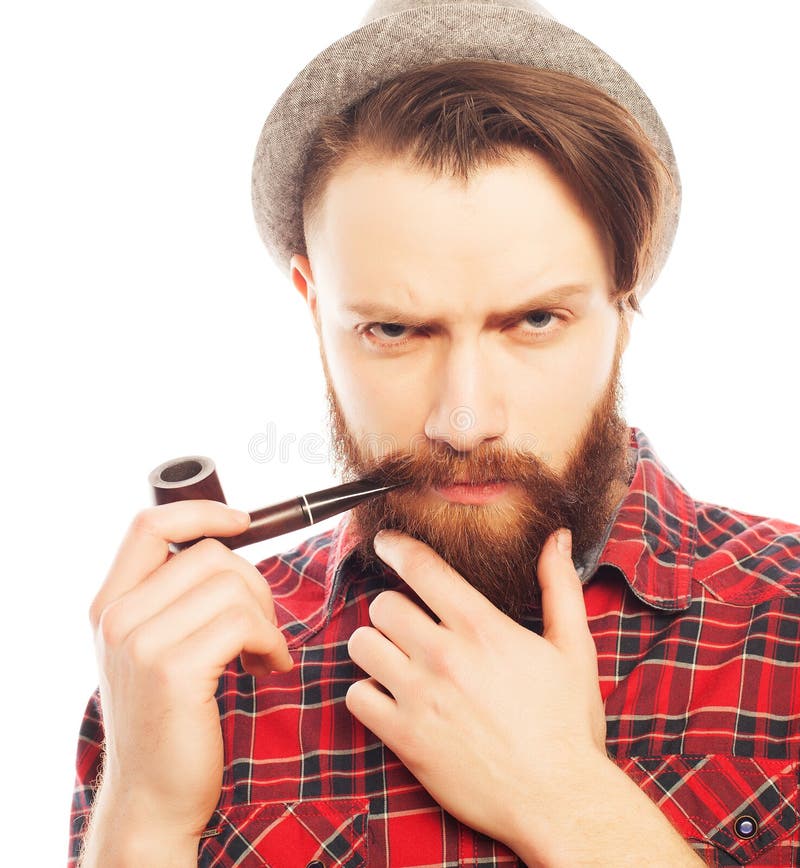 Bearded man smoking a pipe stock image. Image of male - 65571907