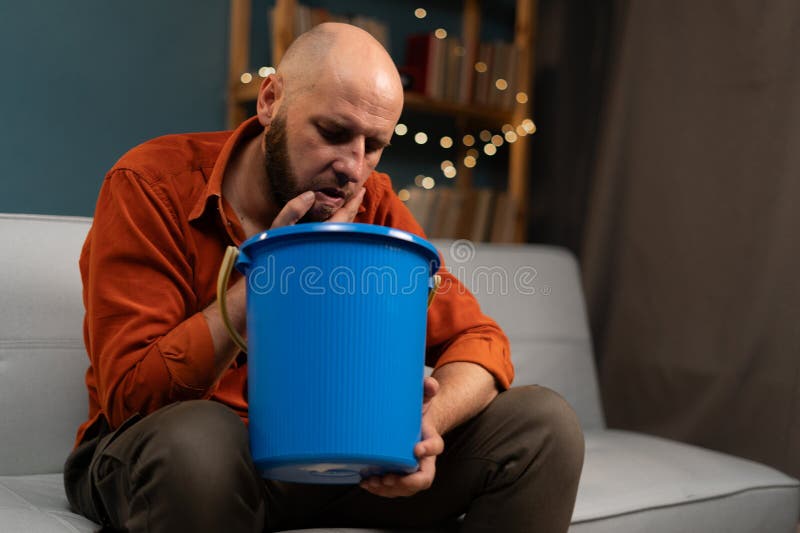 Bearded Man Suffering from Sick Stomach and Vomiting Sitting on Sofa ...
