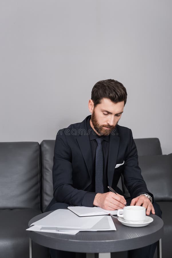 Bearded Man in Suit Writing on Stock Image - Image of handsome, papers ...
