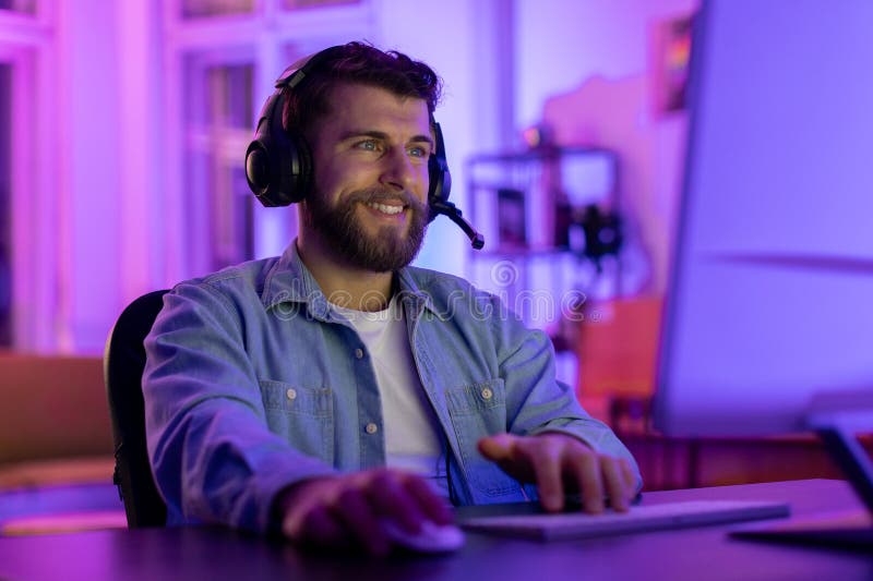 Bearded Man Using a Headset at the Computer Stock Image - Image of ...
