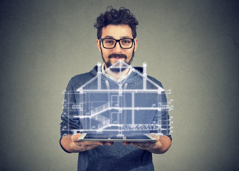 Bearded Man Using Portable Electronic Pro Tablet Showing New Home ...