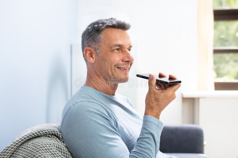Bearded Man Using Voice Assistant on Mobile Phone Stock Image - Image ...