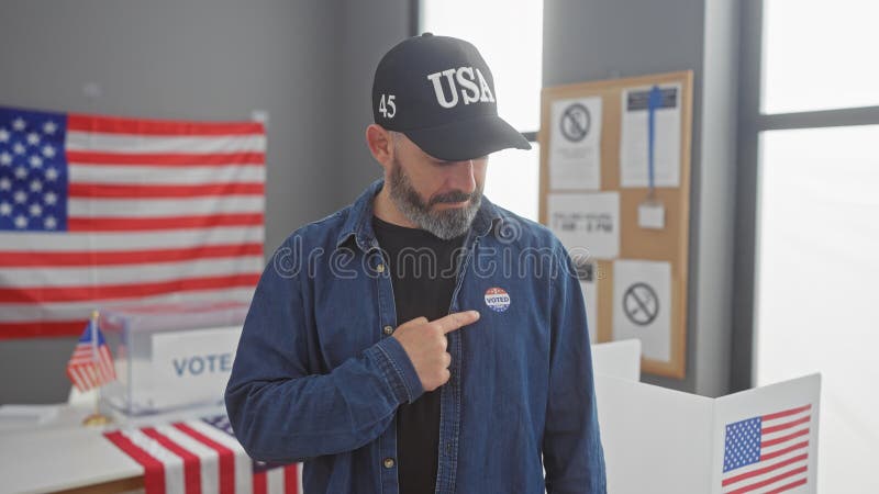 A Bearded Man with a Voted Sticker Points To Himself at a U Stock Photo ...