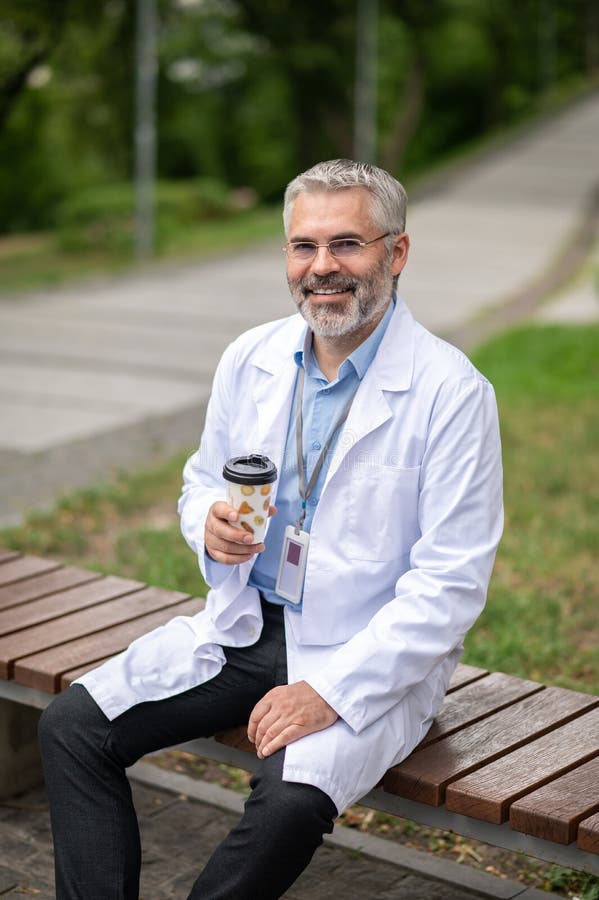 Bearded Mature Man in Na Lab Coat with a Cup of Coffee Stock Photo ...