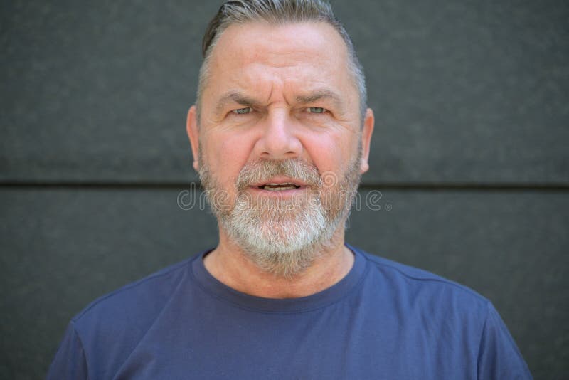 Bearded Middle Aged Man Staring at Camera in Consternation Stock Image ...