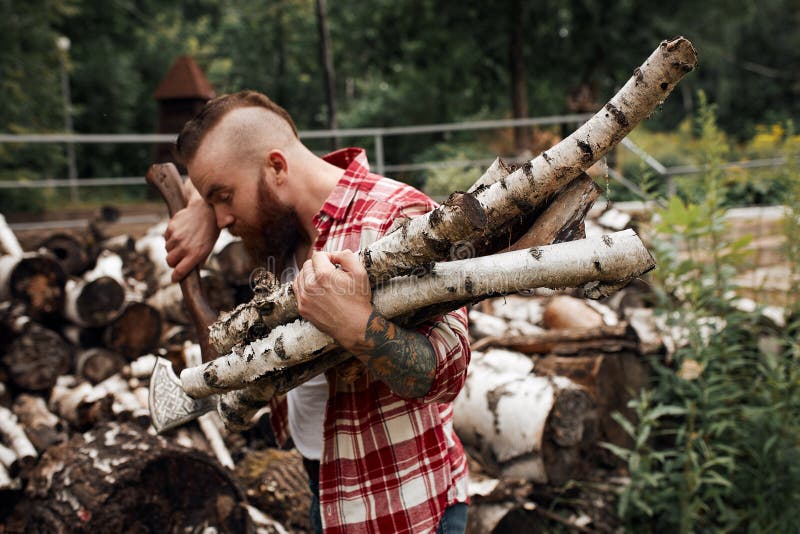 Bearded Man with Firewoods and with Axe on Shoulder Stock Image - Image ...