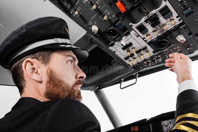 Bearded Pilot in Cap Reaching Overhead Stock Image - Image of modern ...