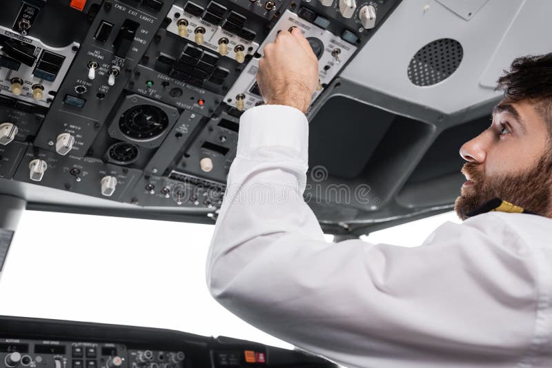 Bearded Pilot Pressing Button on Overhead Stock Image - Image of ...