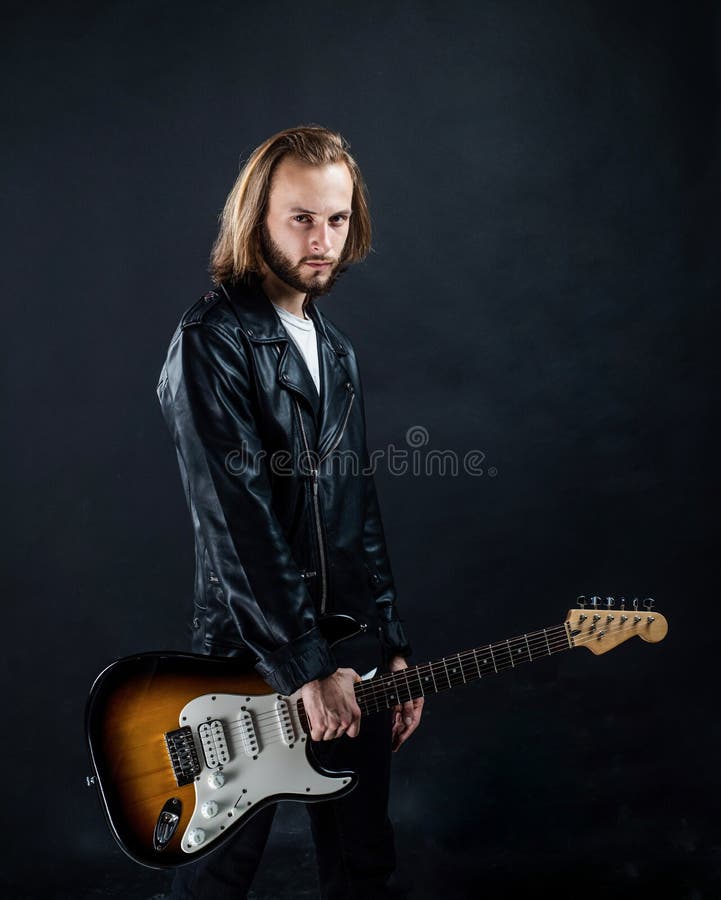 Bearded Rock Musician Playing Electric Guitar in Leather Jacket ...