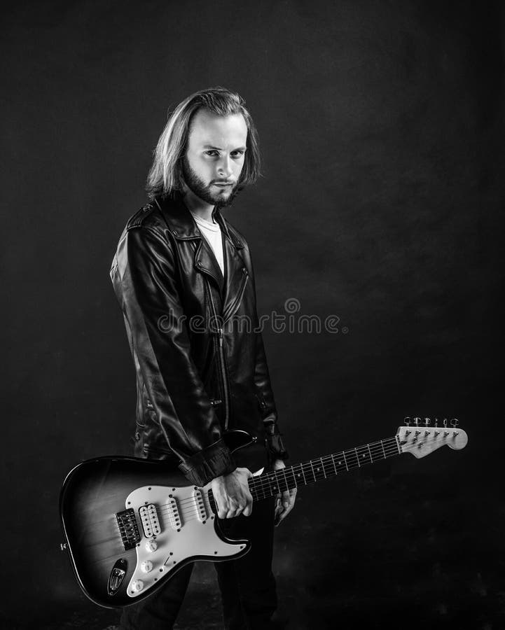 Bearded Rock Musician Playing Electric Guitar in Leather Jacket ...