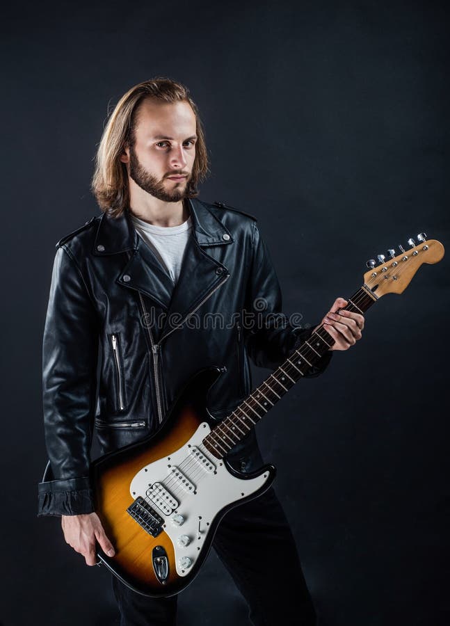 Bearded Rock Musician Playing Electric Guitar in Leather Jacket ...