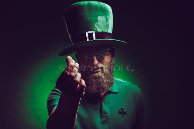 Bearded Young Man in Green Irish Hat and Funny Eyeglasses Gesturing ...