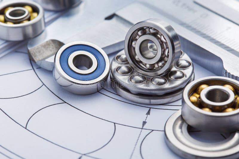 Bearings of Different Types, Micrometer, Caliper and Ruler on the ...