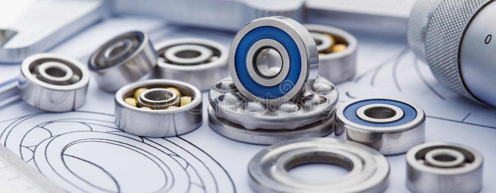 Bearings of Different Types, Micrometer, Caliper and Ruler on the ...