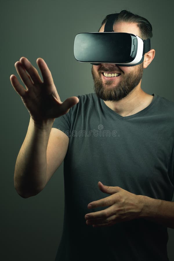 Bearrd Man Using a Virtual Reality Set. VR Emotions Stock Photo - Image ...