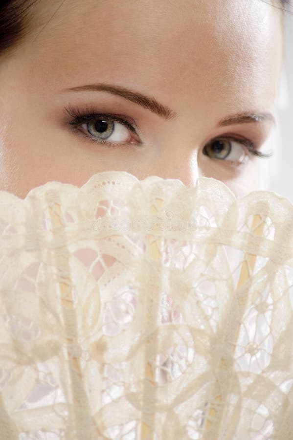 Beatiful woman with a fan stock image. Image of face - 34824655