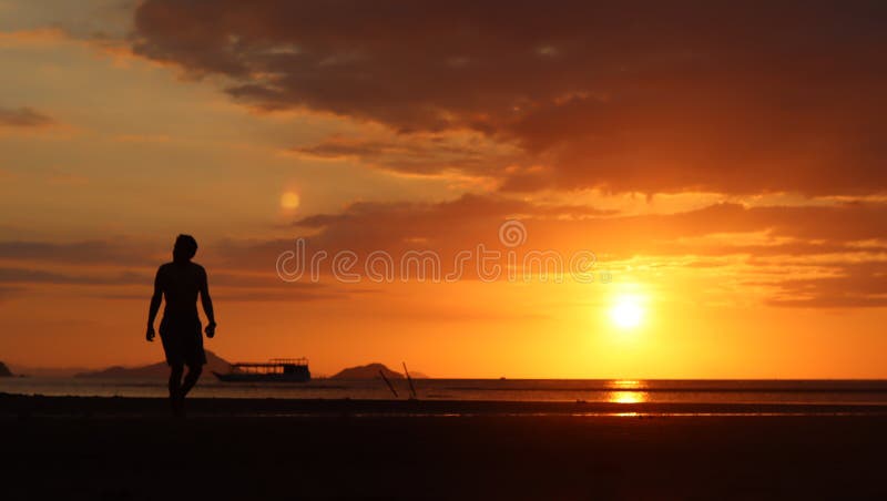 A Beatifull Sunset View with a Man Stock Photo - Image of sunrise ...
