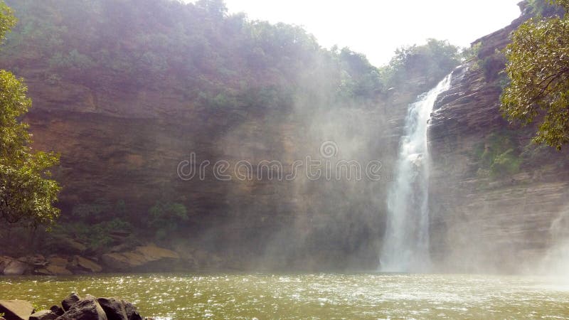 A Waterfall is an Area Where Water Flows Over a Vertical Drop or a ...