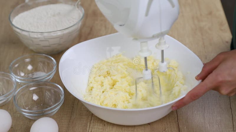 Beating Butter with Sugar with a Mixer with Whisk, the Process of ...