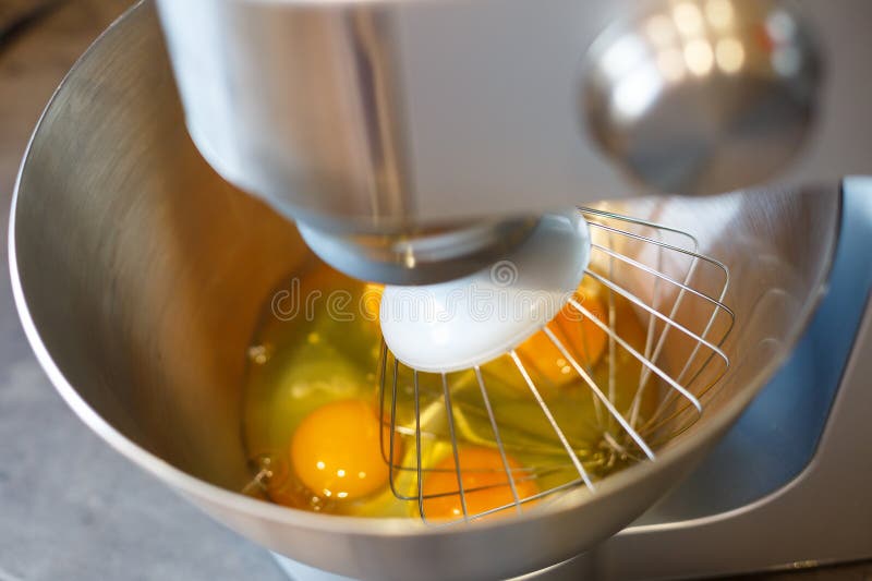 Beating Eggs with Sugar in a Kitchen Machine. Cream Nozzle Stock Image ...