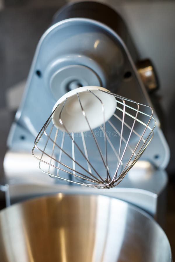 Beating Eggs with Sugar in a Kitchen Machine. Cream Nozzle Stock Photo ...