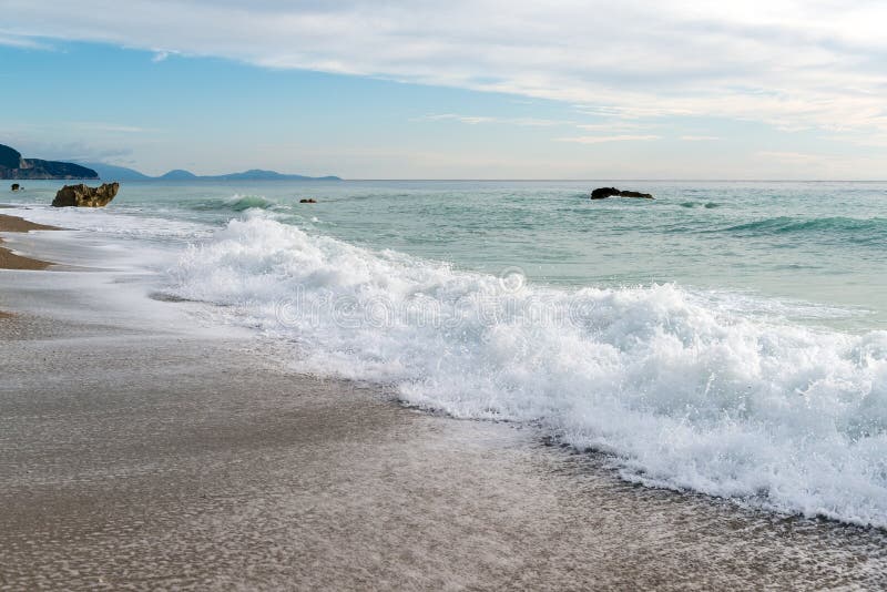 Beating of waves, Greece stock image. Image of beach - 78287305