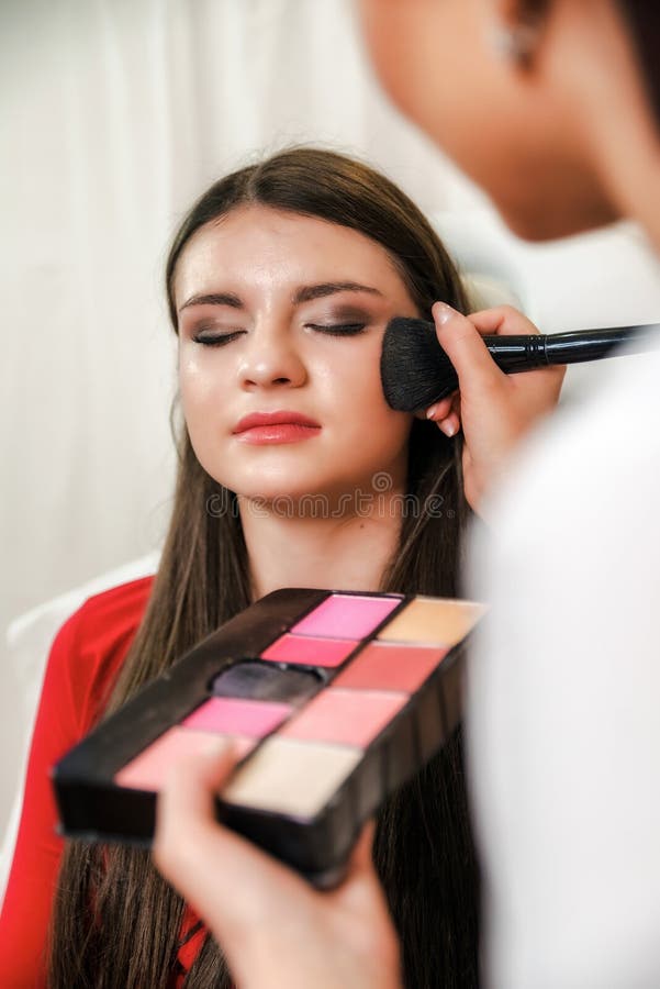 Beautician Making Professional Make Up Procedure in Beauty Salon Stock ...