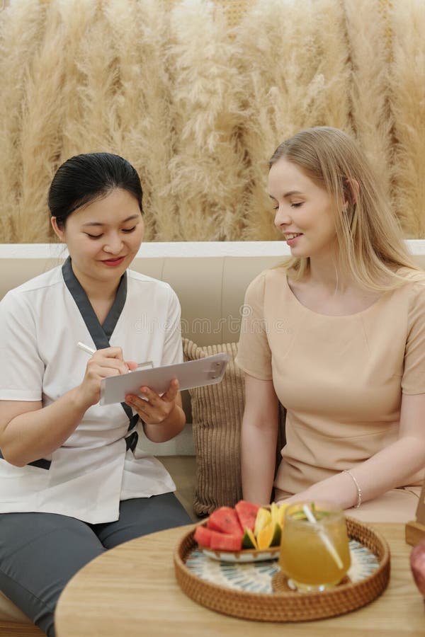 Beautician Talking To Client Stock Photo - Image of salon, consult ...