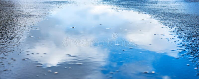 Beautiful Abstract Image of the Sky and Clouds Reflecting in a Puddle ...