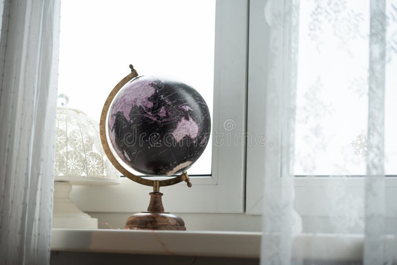 Aesthetic Globe on a White Windowsill Stock Photo - Image of front ...