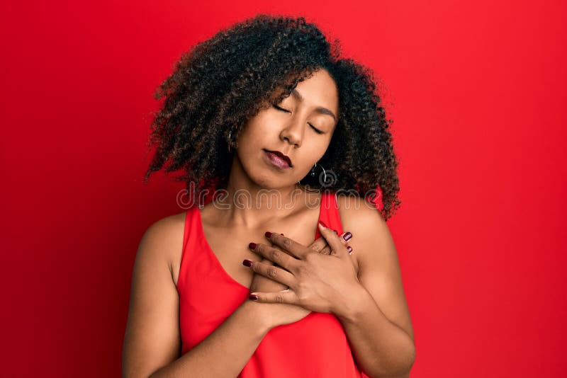 Beautiful African American Woman With Afro Hair Wearing Casual Clothes