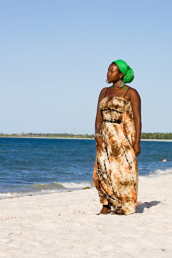 Beautiful African Woman Looking at the Ocean Stock Photo - Image of ...