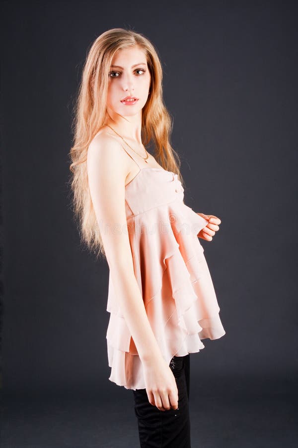 Alluring Blond Beautiful Woman with Curly Short Hair Style Posing in ...