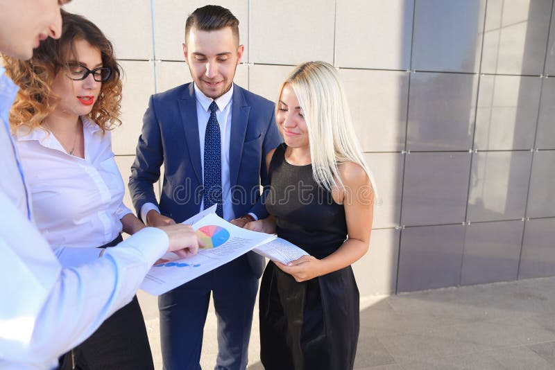 Beautiful Ambitious Young Men and Women Consider and Study Sched Stock ...