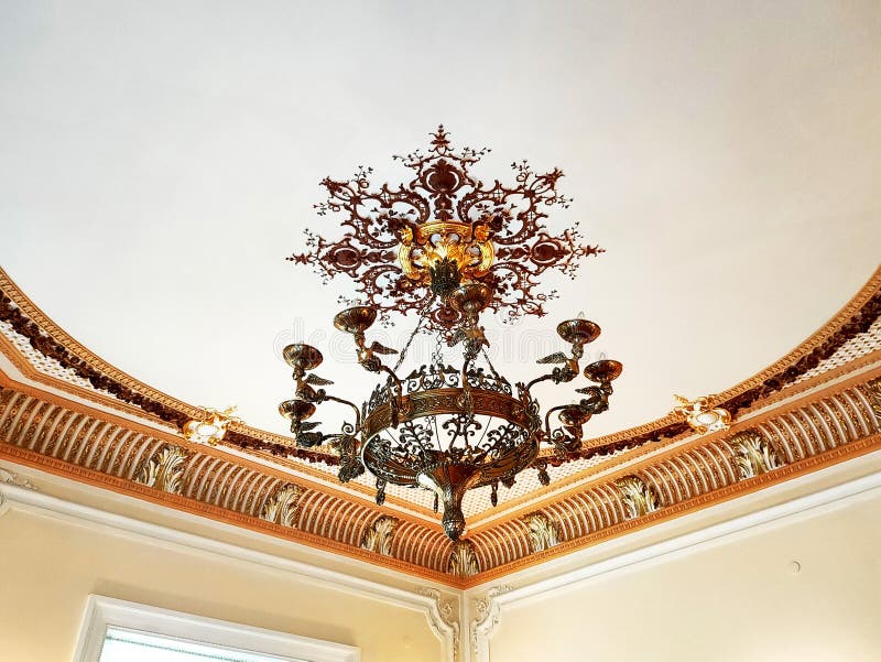 Beautiful Ancient Copper Chandelier on the Ceiling with Patterns in the ...