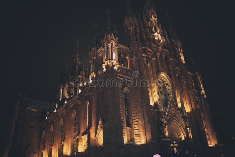 A Beautiful Antique Catholic Church with Illuminated Lanterns Stock ...
