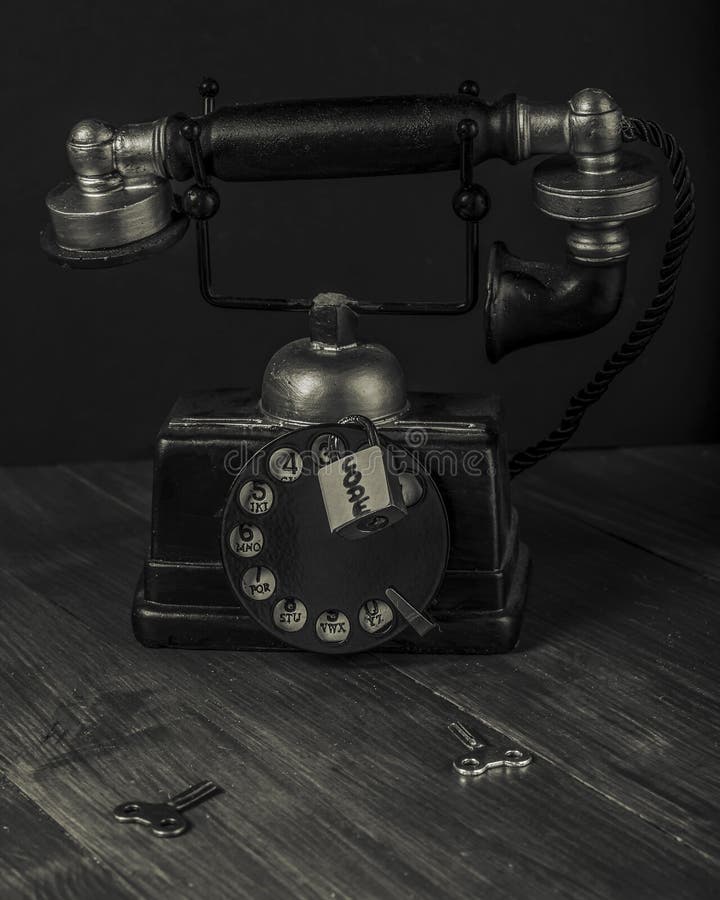 An Antique Vintage Manual Telephone is Locked by a Padlock Marked Code ...
