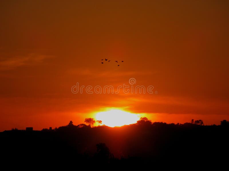 The Beautiful Appearance of Sun Rising Behind Clouds and Sun Rays ...