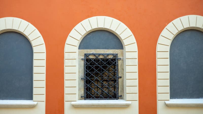 Beautiful Arched Window in Building, View from Outdoors. Protective ...