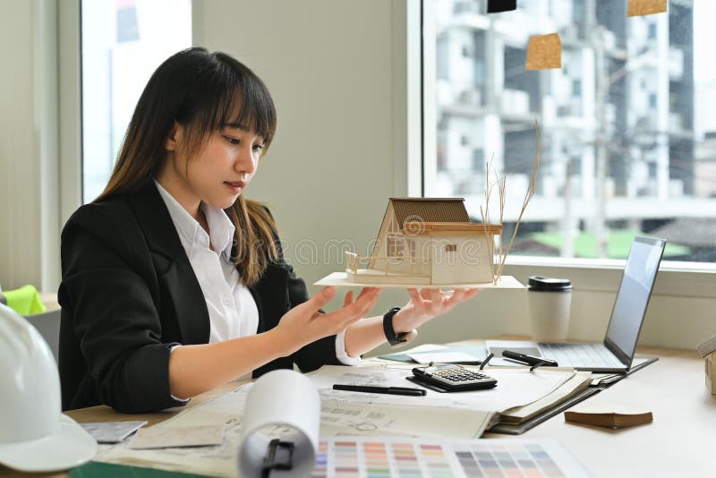 Beautiful Architects Woman Working on Design of a Construction Plan and ...