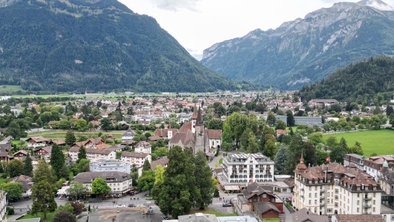 Beautiful Architecture of Interlaken, Switzerland, with Mountains in ...