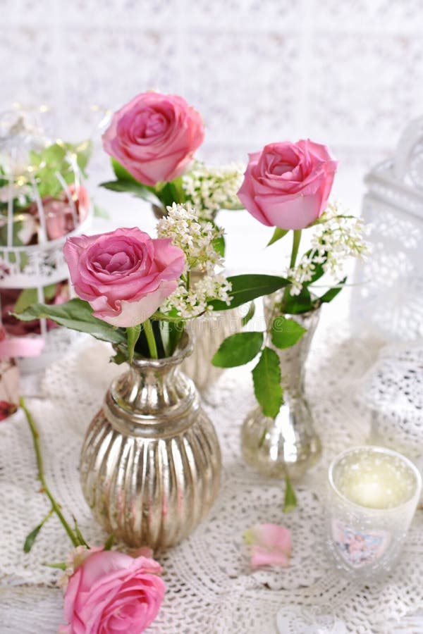 Beautiful Arrangement with Single Pink Roses in Silver Vases Stock ...